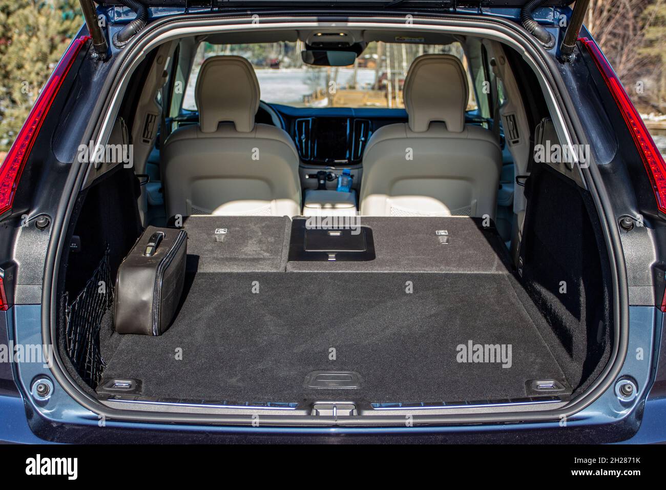 Huge, clean and empty car trunk in interior of a modern compact suv ...