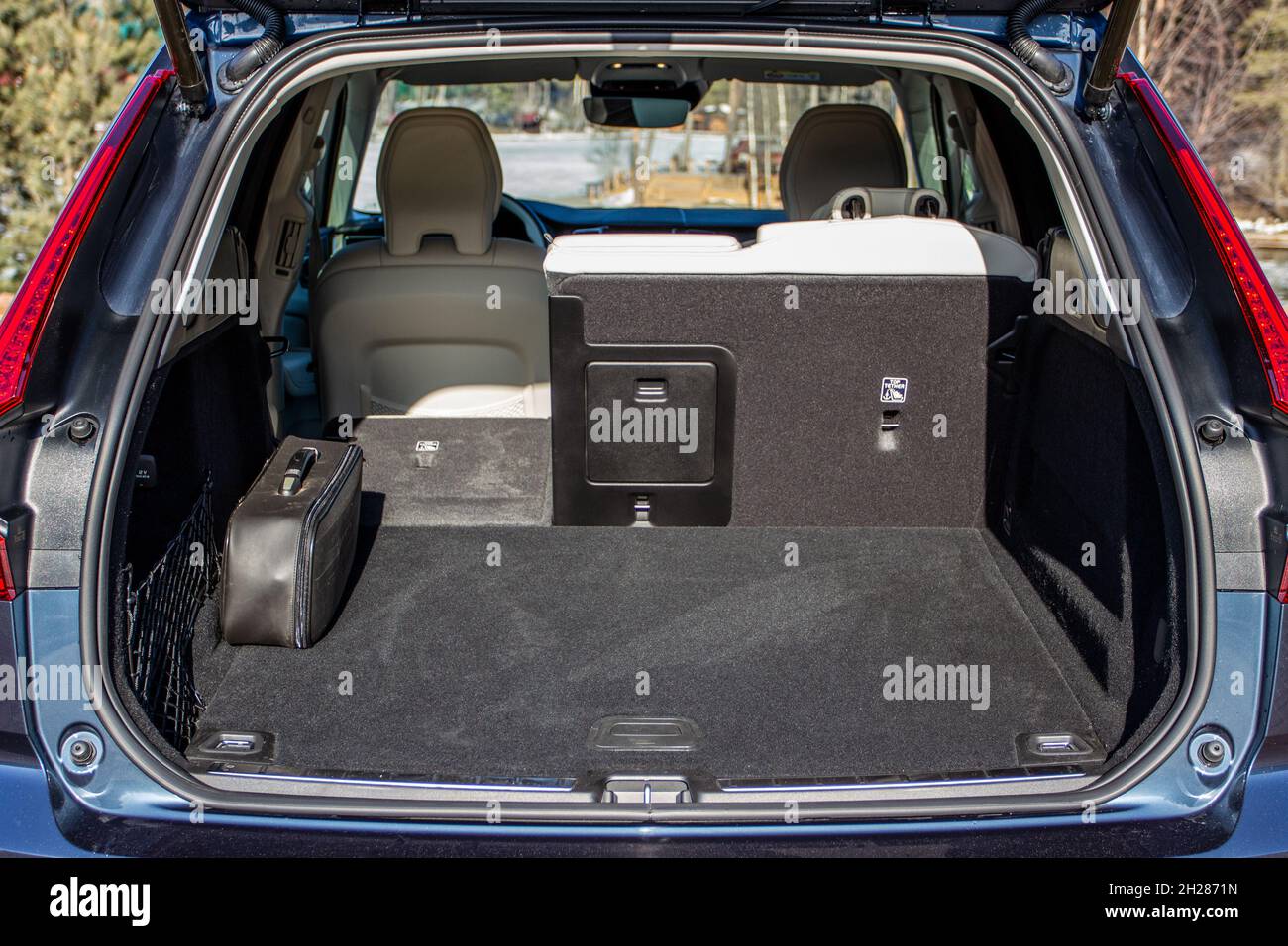 Huge, clean and empty car trunk in interior of a modern compact suv ...