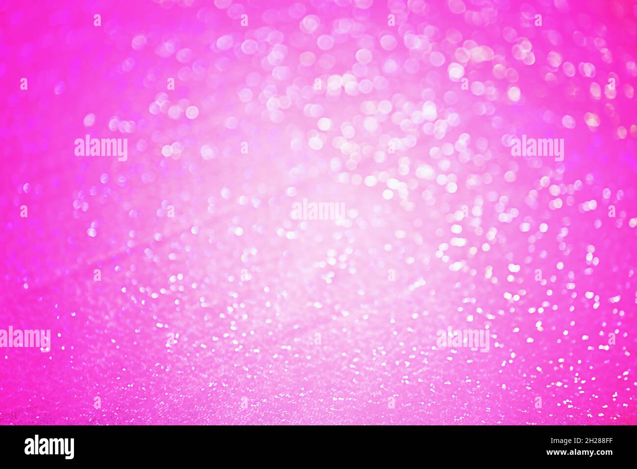 Glitter in defocus. Light pink defocus. Texture for the designer's work ...
