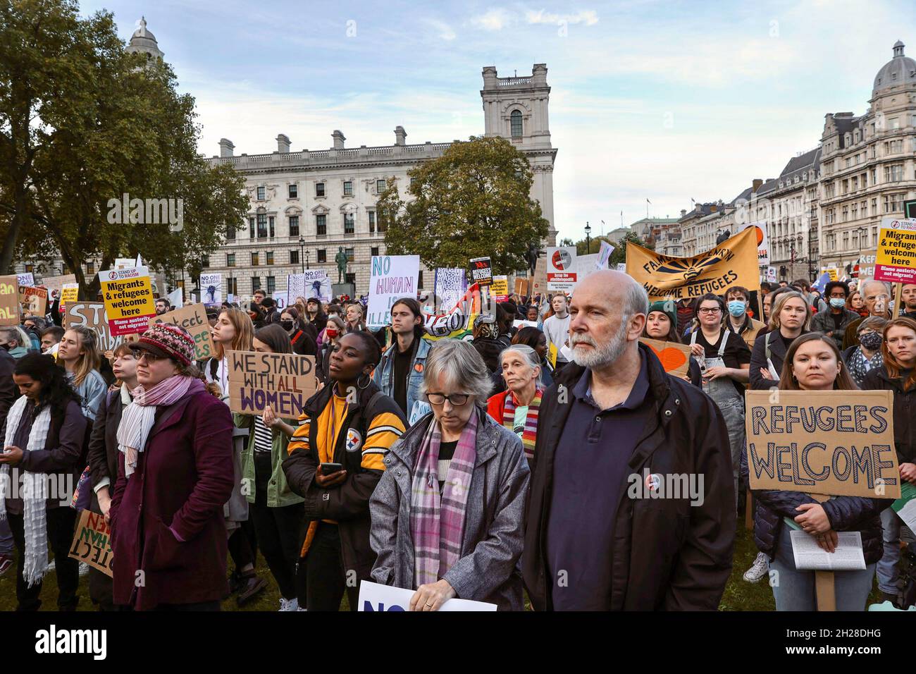 A crowd of protesters seen holding banners and placards, during the ...