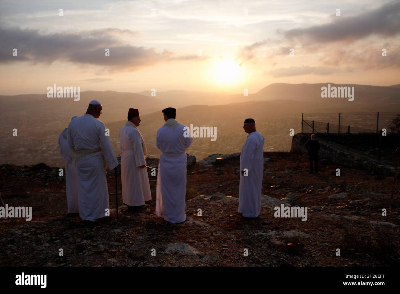 Members of the Samaritan community perform a circumambulation ceremony ...