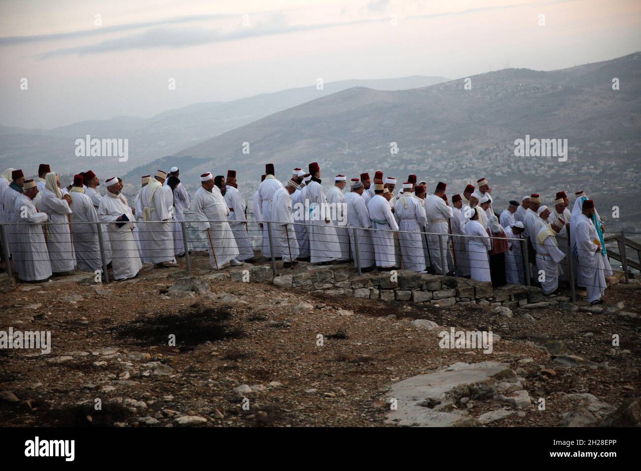 Members of the Samaritan community perform a circumambulation ceremony ...