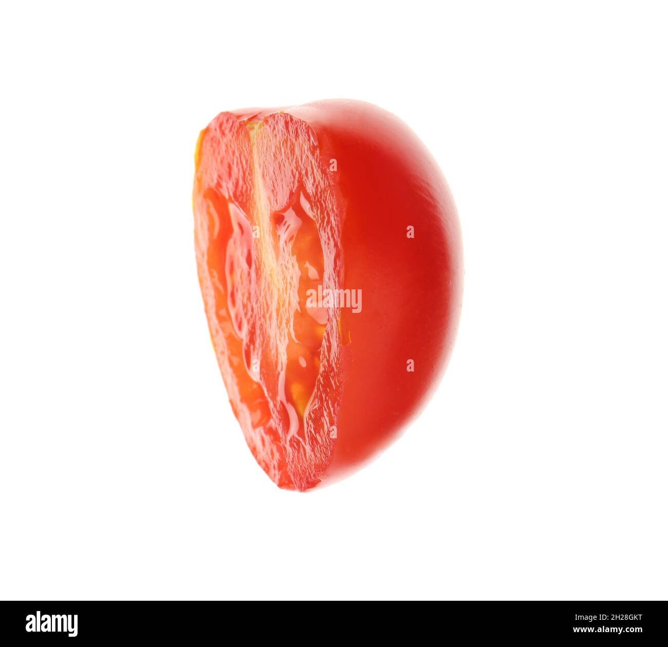 Slice of ripe tomato on white background Stock Photo - Alamy