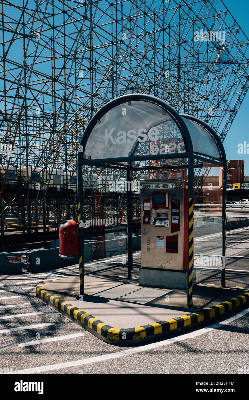 Vertical view of an automated teller machine (ATM) under the blue sky ...