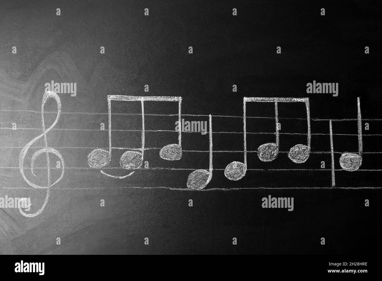 Music scale with treble clef and notes on chalkboard, top view Stock ...