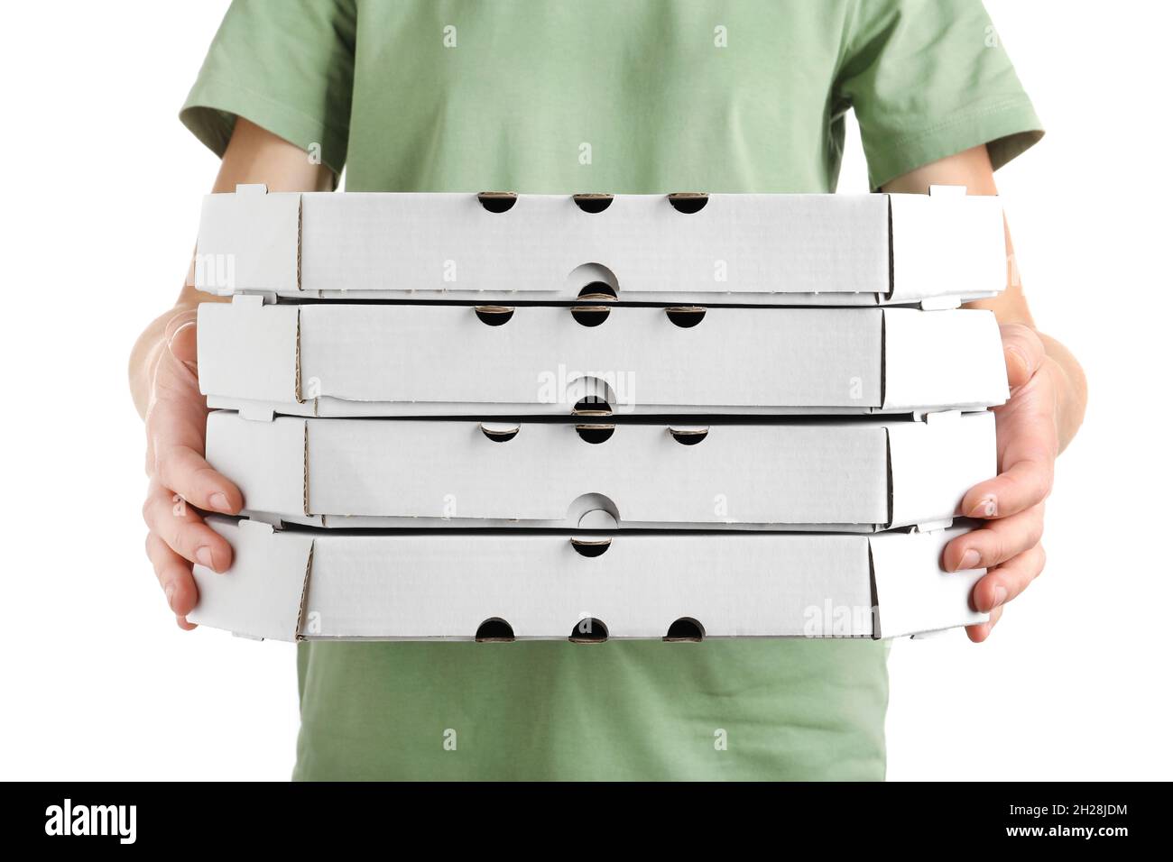 Woman holding cardboard pizza boxes on white background Stock Photo - Alamy