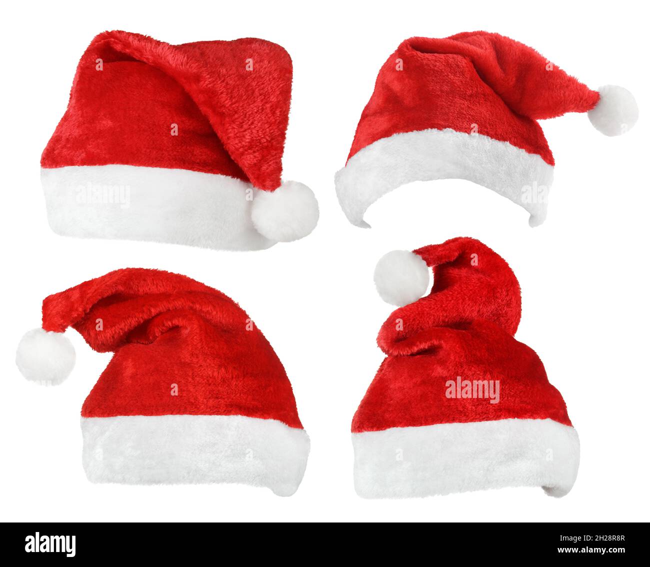 Set of red Santa Claus hats isolated on white background Stock Photo ...