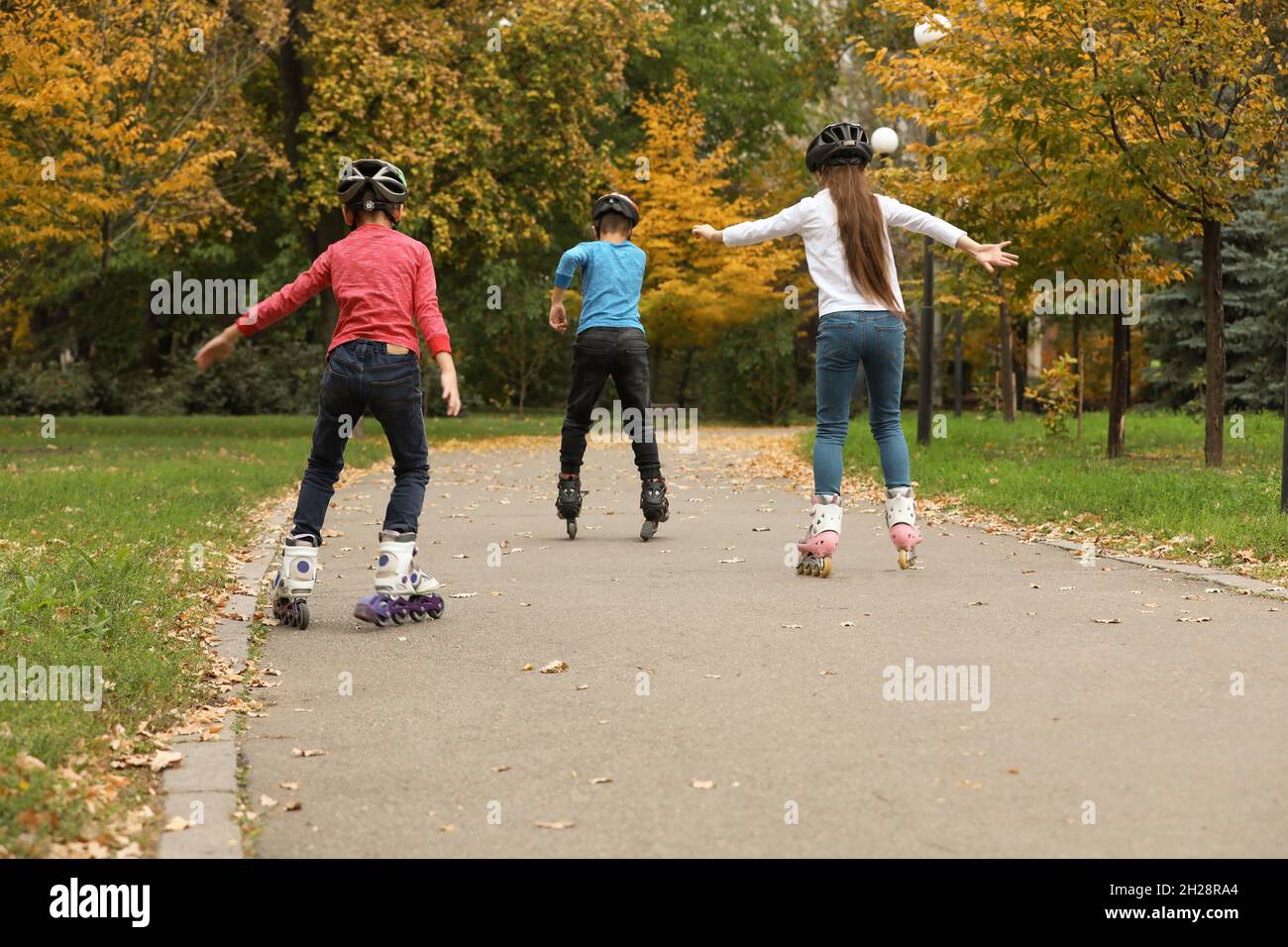 Kids with rollerskates hi-res stock photography and images - Alamy