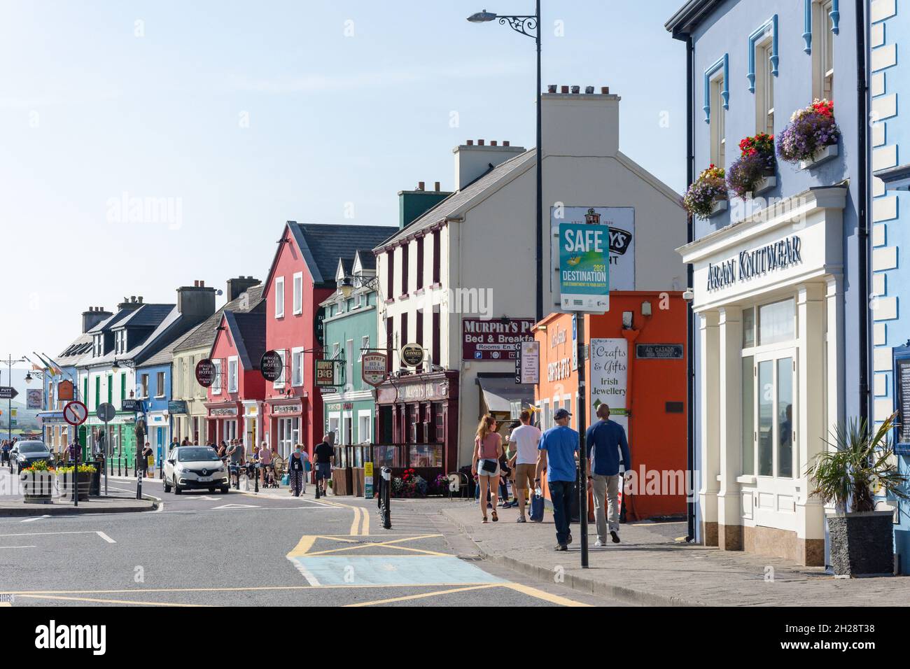 Restaurants and bars on seafront strand street busy coastal ding hi-res ...