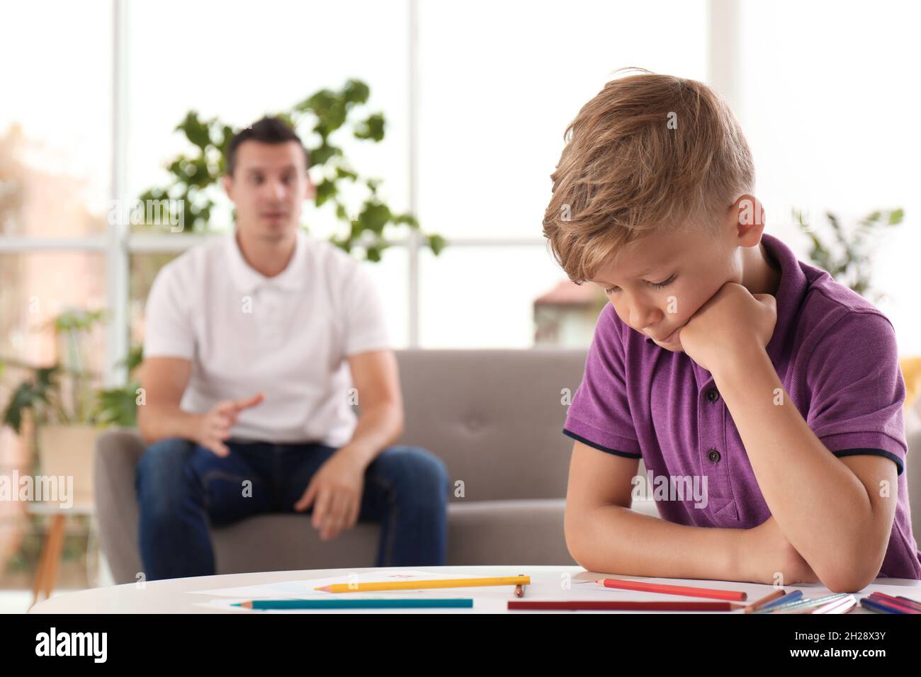 Father scolding child at home. Family relationships Stock Photo - Alamy