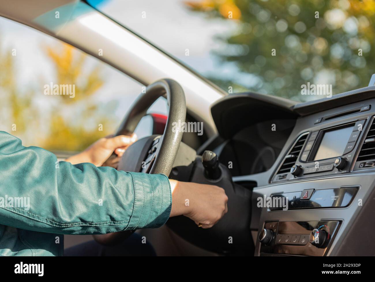 Closeup of a driver hand starting the car with the key Stock Photo - Alamy