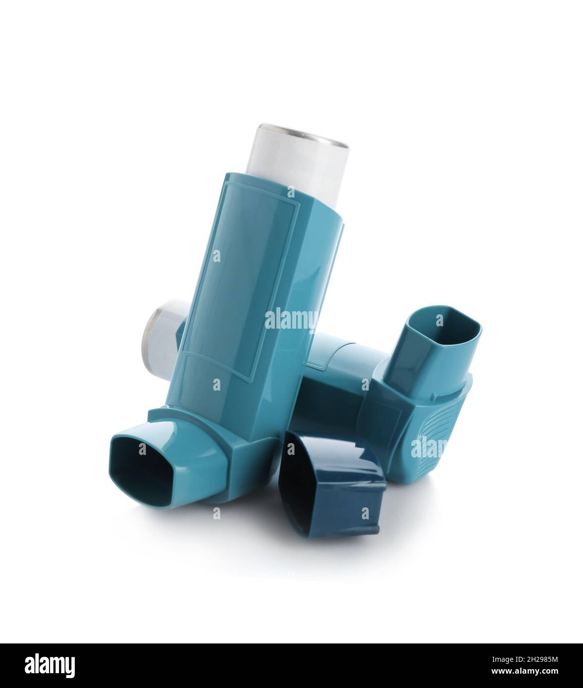Two portable asthma inhalers on white background Stock Photo - Alamy
