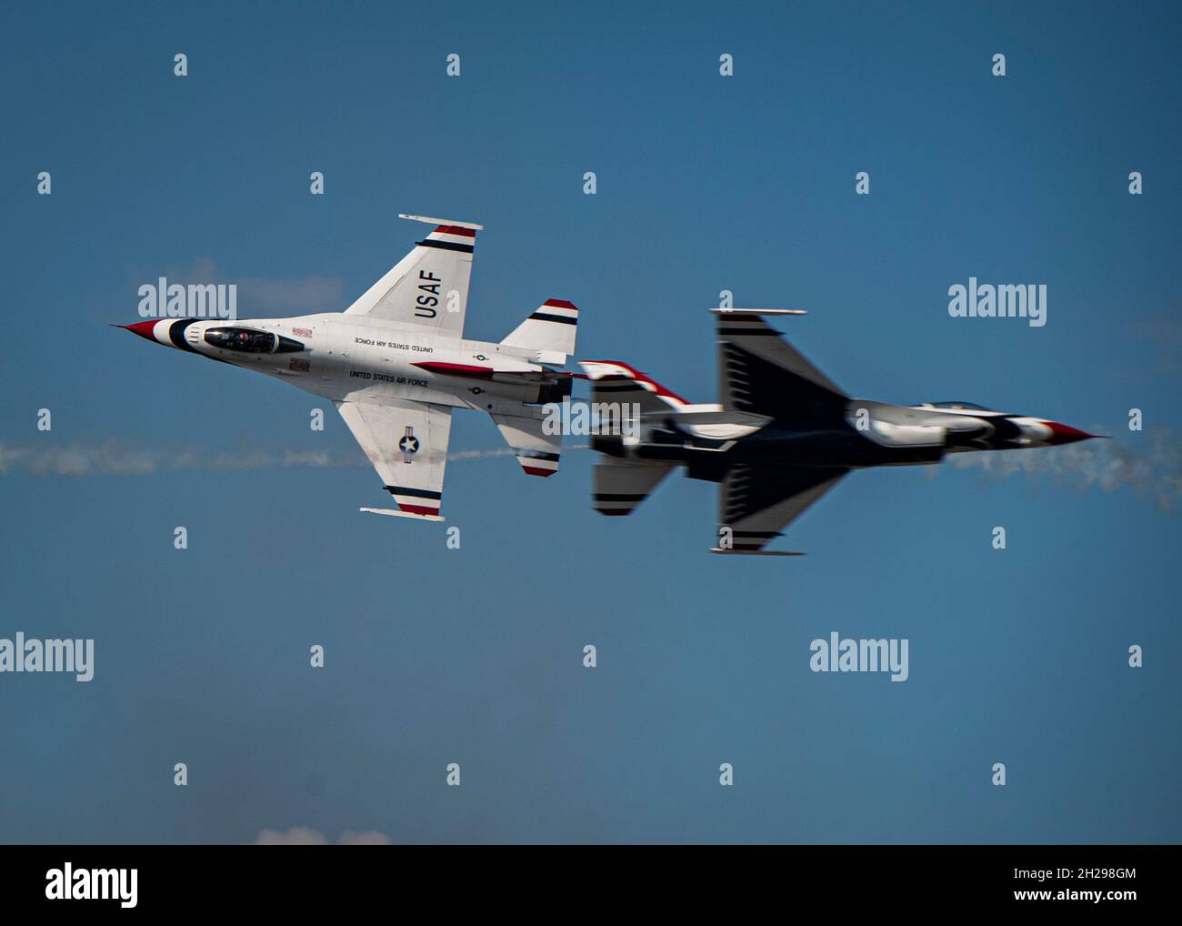 Two F-16 Fighting Falcon fighter jets, assigned to the United States ...