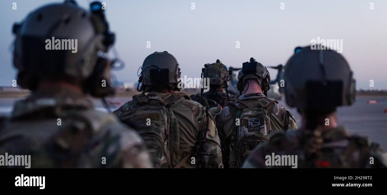 A group of Airmen assigned to the 33rd Special Operations Squadron and ...