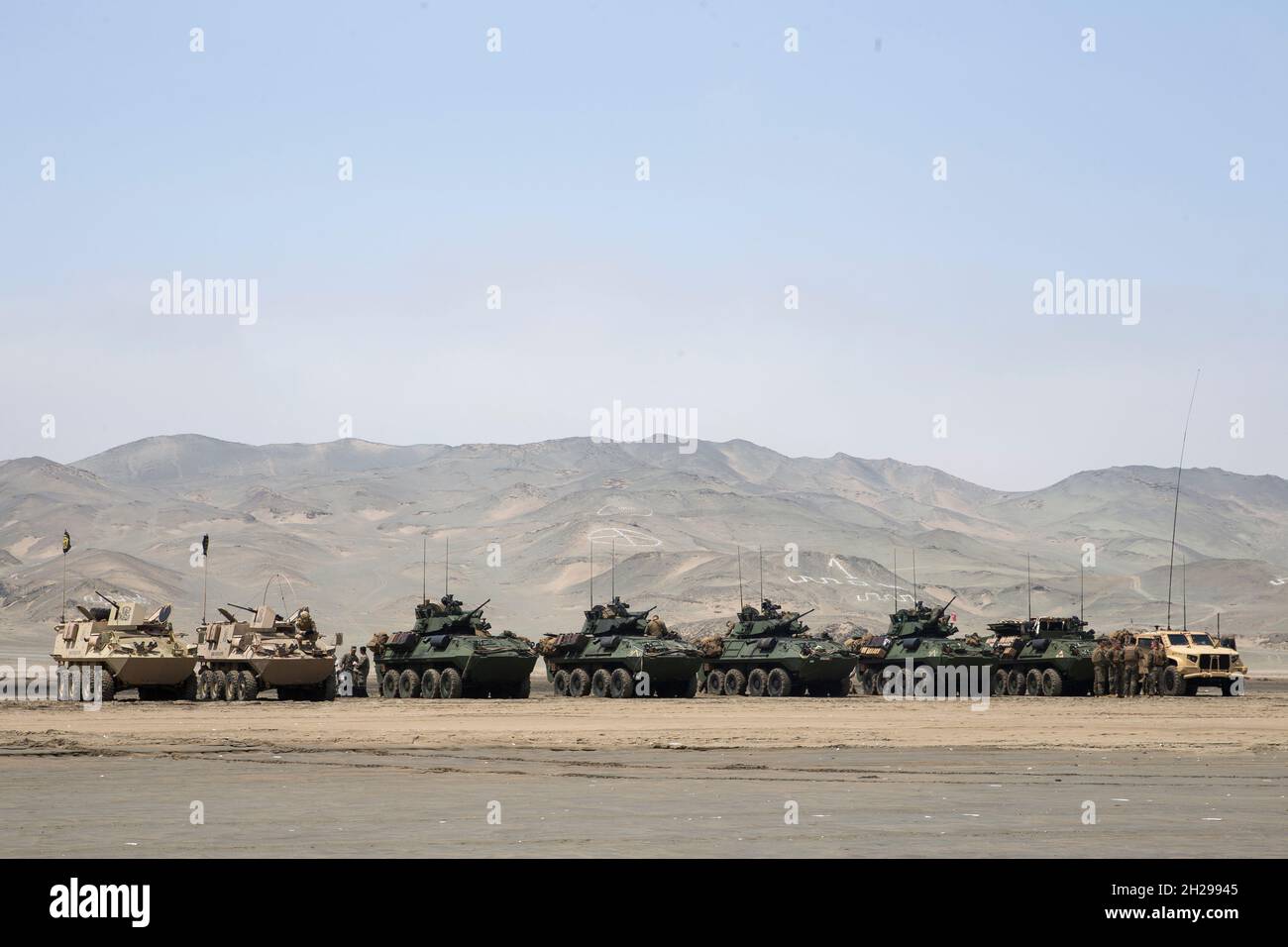 U.S. Marine Corps and Peruvian light armored vehicles stand by before ...