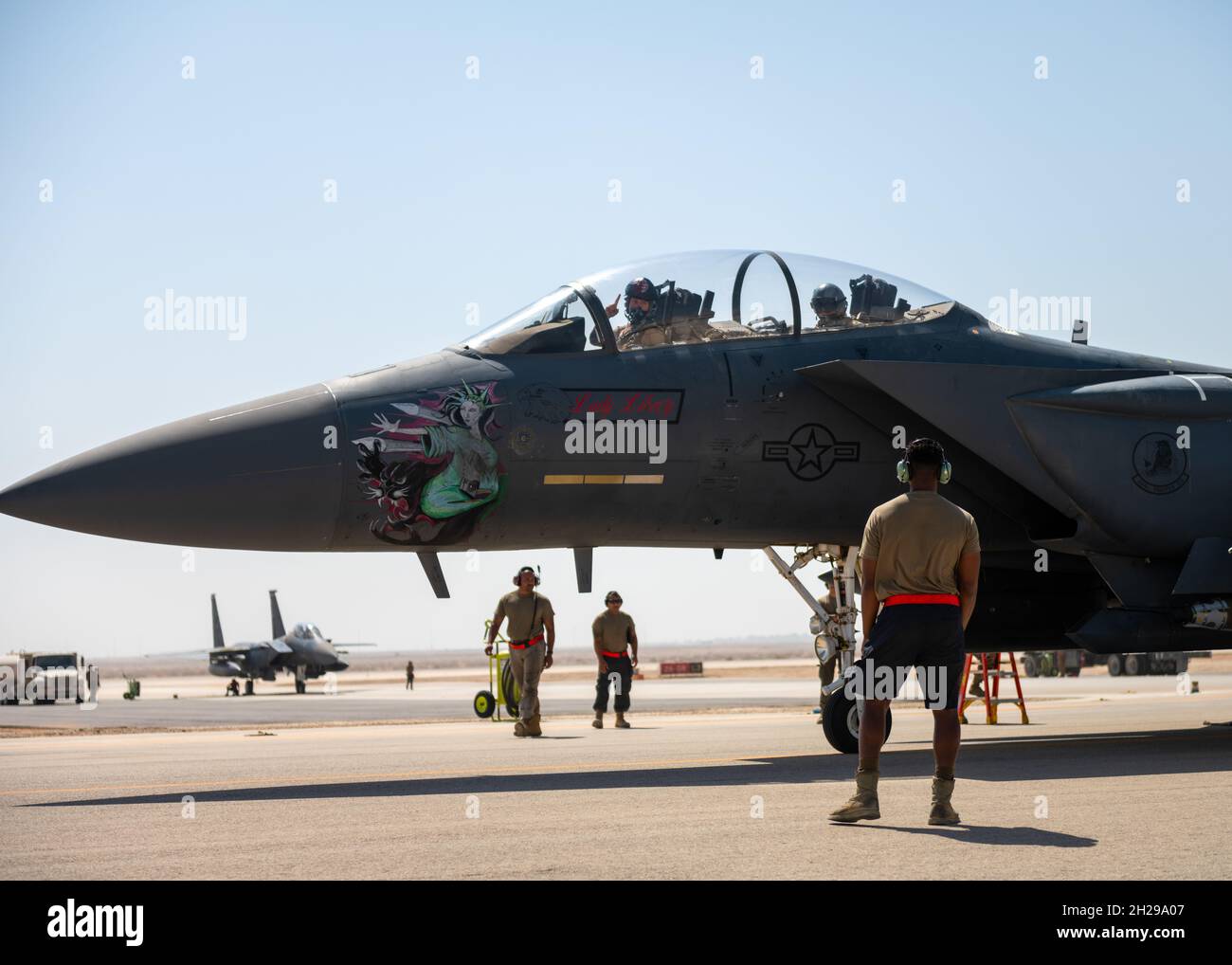 U.S. Airmen from the 332nd Air Expeditionary Wing participate in an F ...