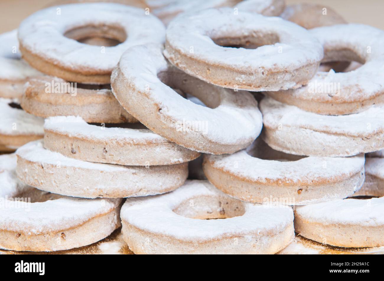 bakery donut-type sweets with icing sugar Stock Photo - Alamy