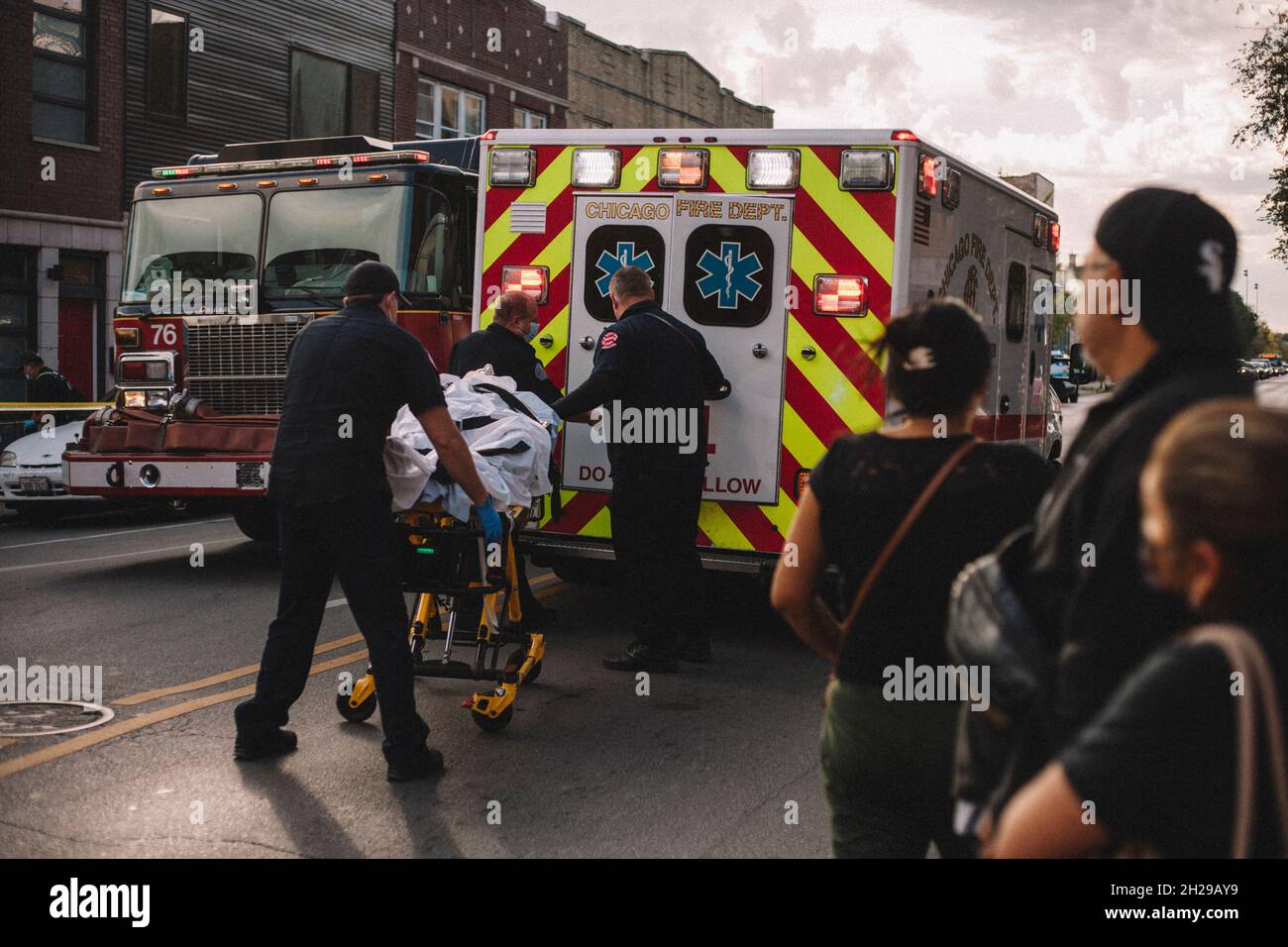 Chicago, IL on October 20 2021. The victim is loaded into the back of ...