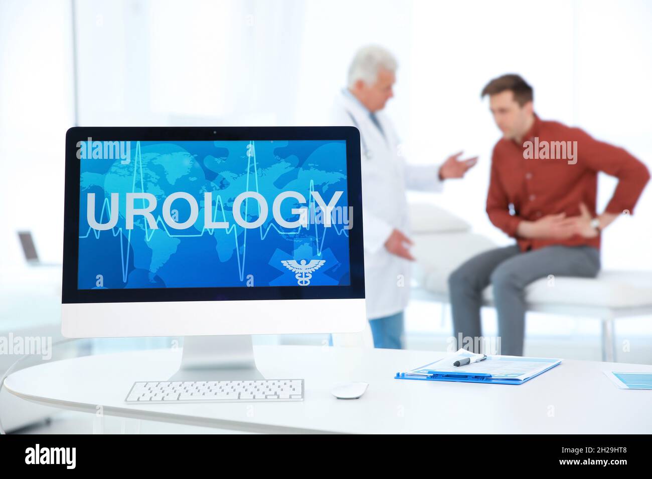 Computer monitor with word UROLOGY and people on background Stock Photo ...