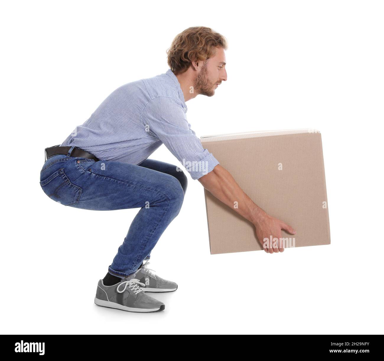 Man lifting box full body hi-res stock photography and images - Alamy