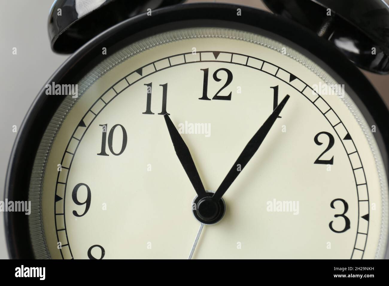 Alarm clock, closeup. Time change concept Stock Photo - Alamy