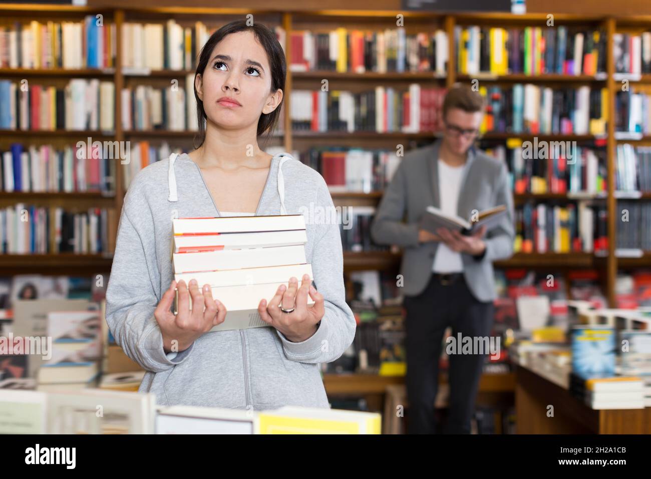 Pretty girl with books hi-res stock photography and images - Alamy