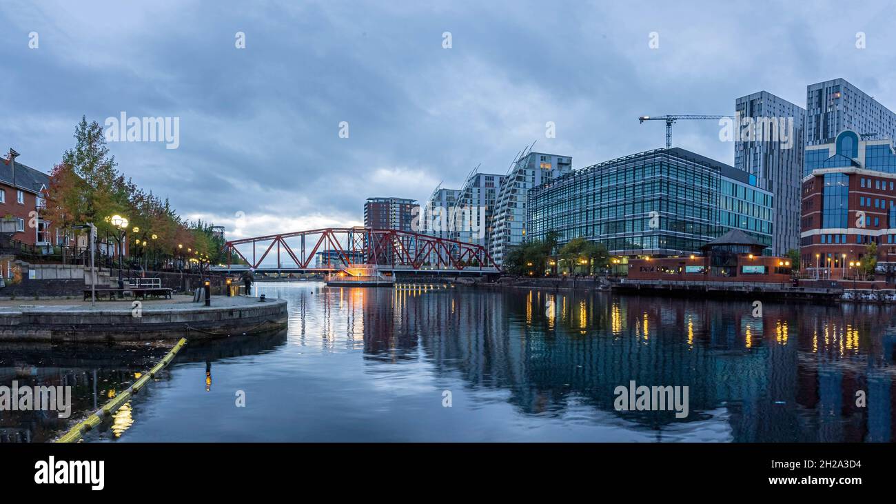 Modern water area buildings illuminated downtown town skyline business ...