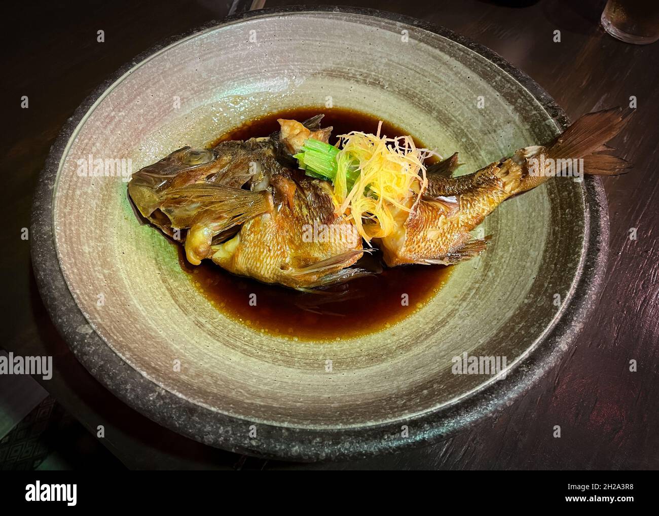 A whole fish cooked in soy sauce in Yokohama, Japan Stock Photo - Alamy