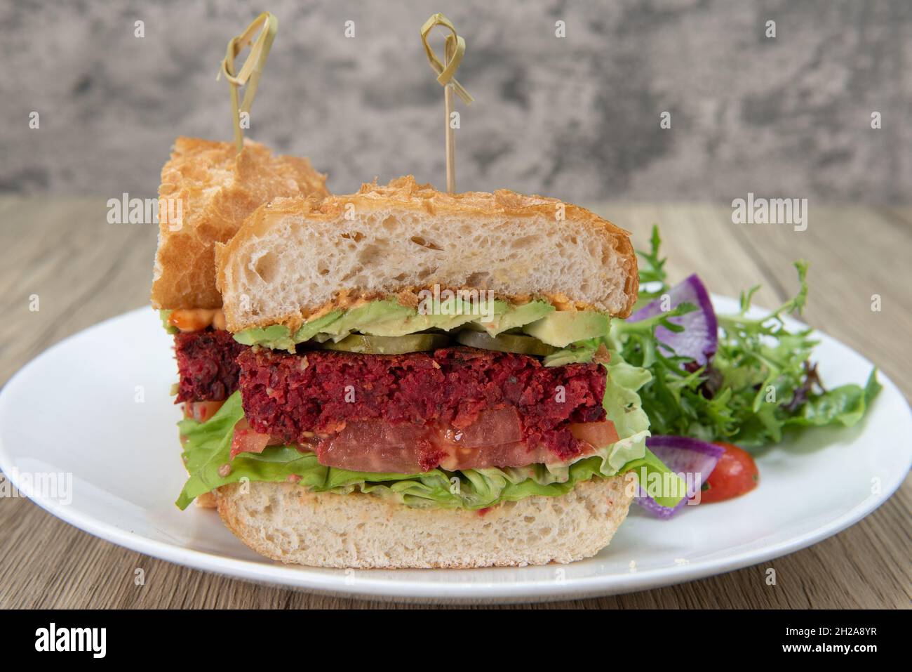 Thick cross section of hearty veggie burger for the healthy diet and ...
