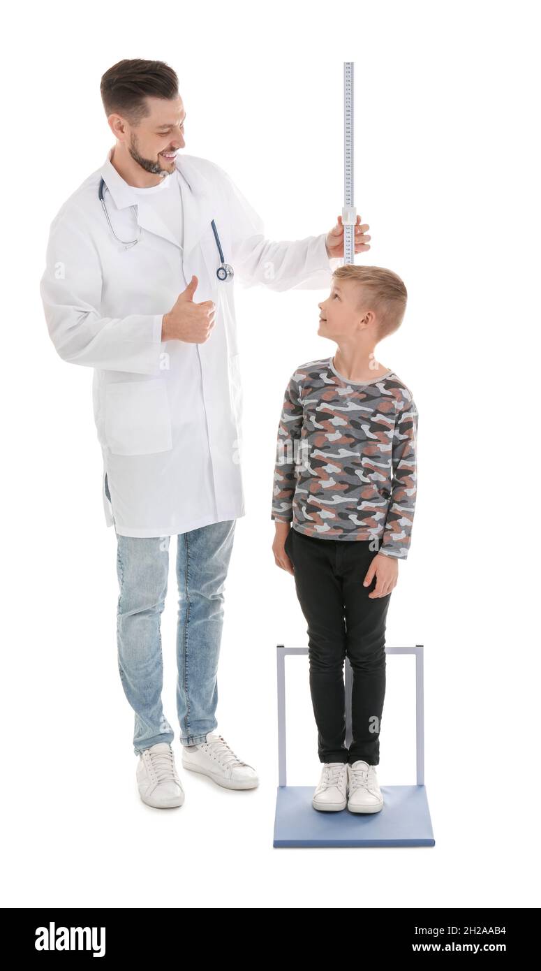 Doctor measuring height child Cut Out Stock Images & Pictures - Alamy