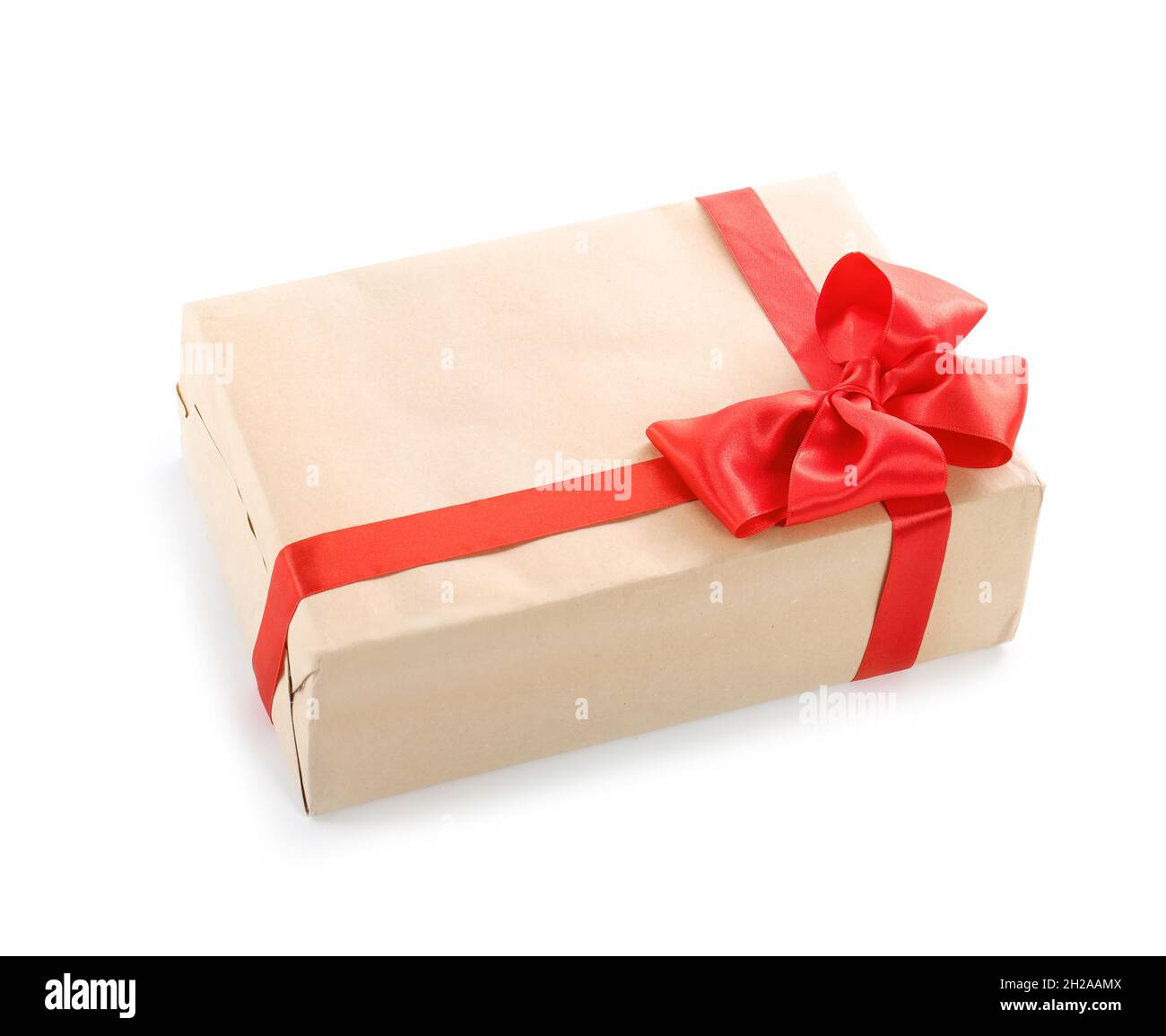 Parcel wrapped in kraft paper with red bow on white background Stock ...