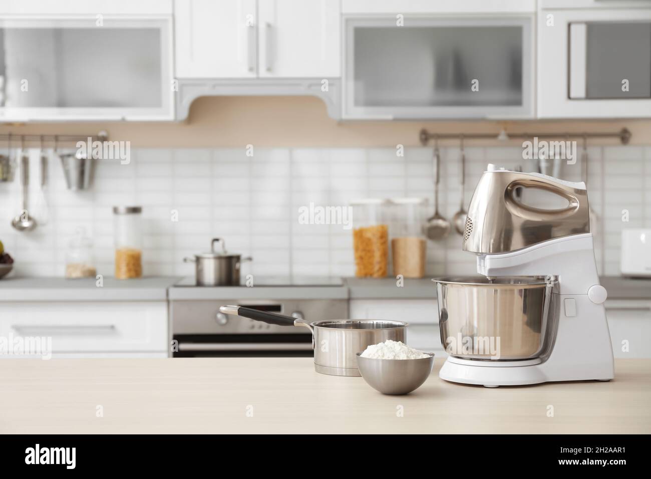 Houseware and blurred view of kitchen interior on background Stock ...