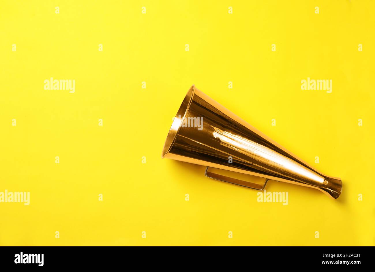 Retro megaphone on color background Stock Photo - Alamy