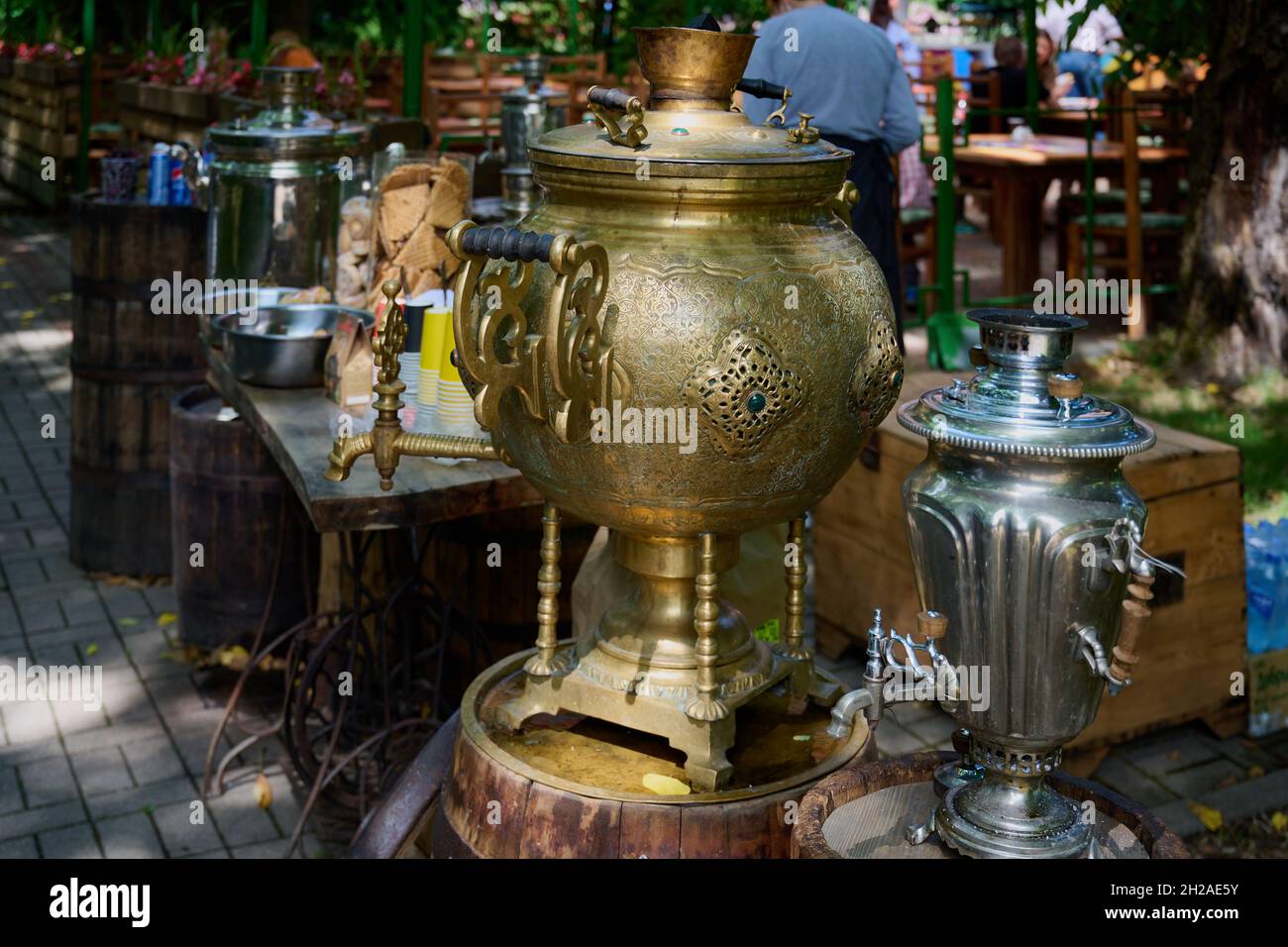 Rustic tea party with samovar, cookies and jam in the park Stock Photo ...