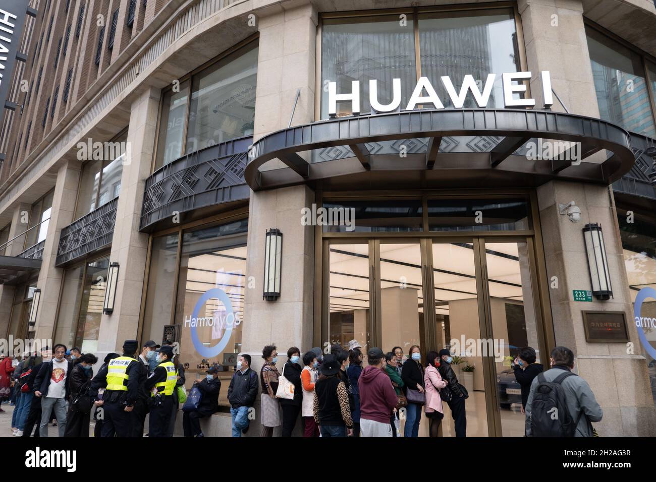 SHANGHAI, CHINA - OCTOBER 21, 2021 - People queue up in front of huawei ...
