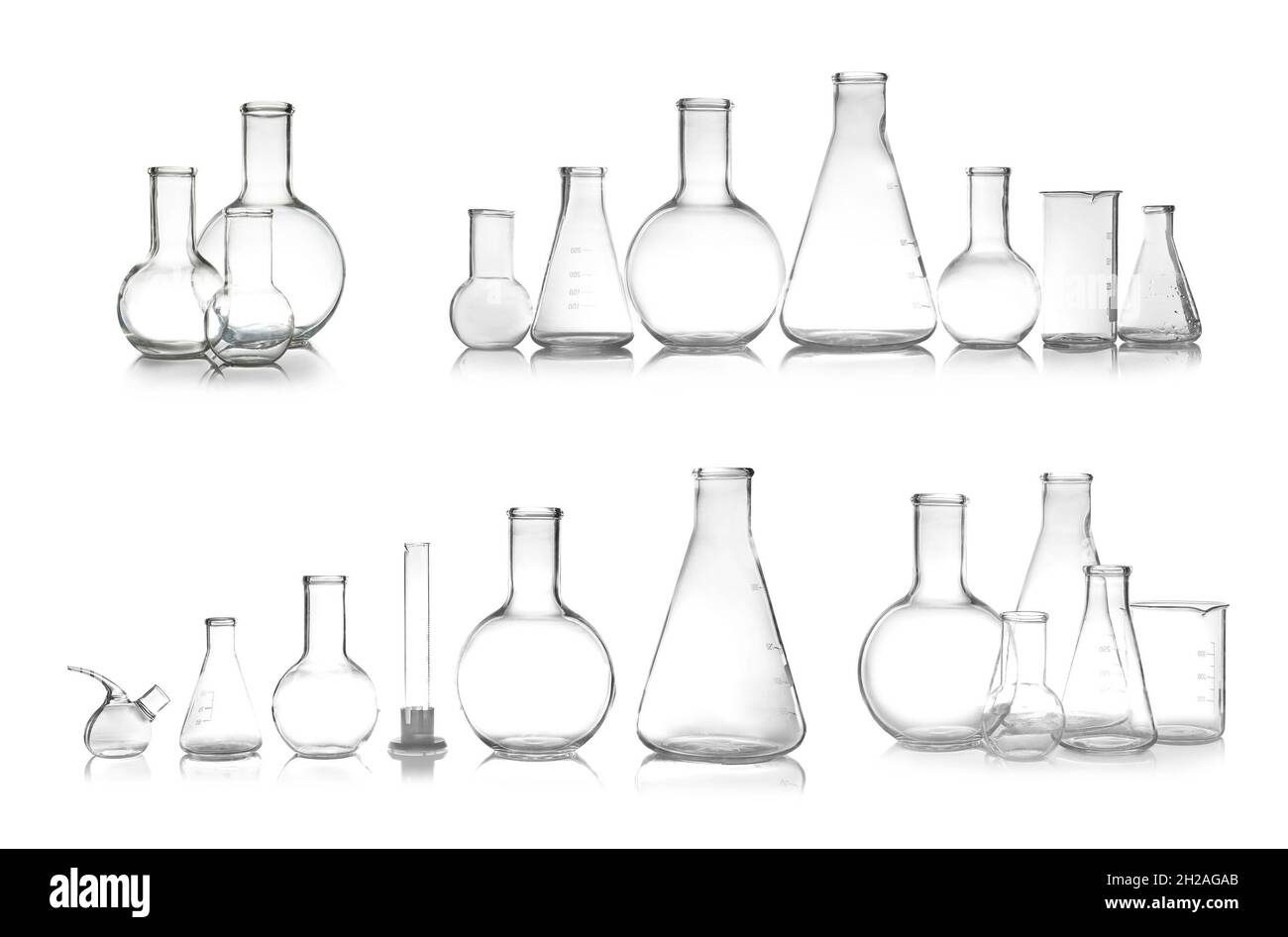Set with different empty laboratory glassware for analysis on white ...