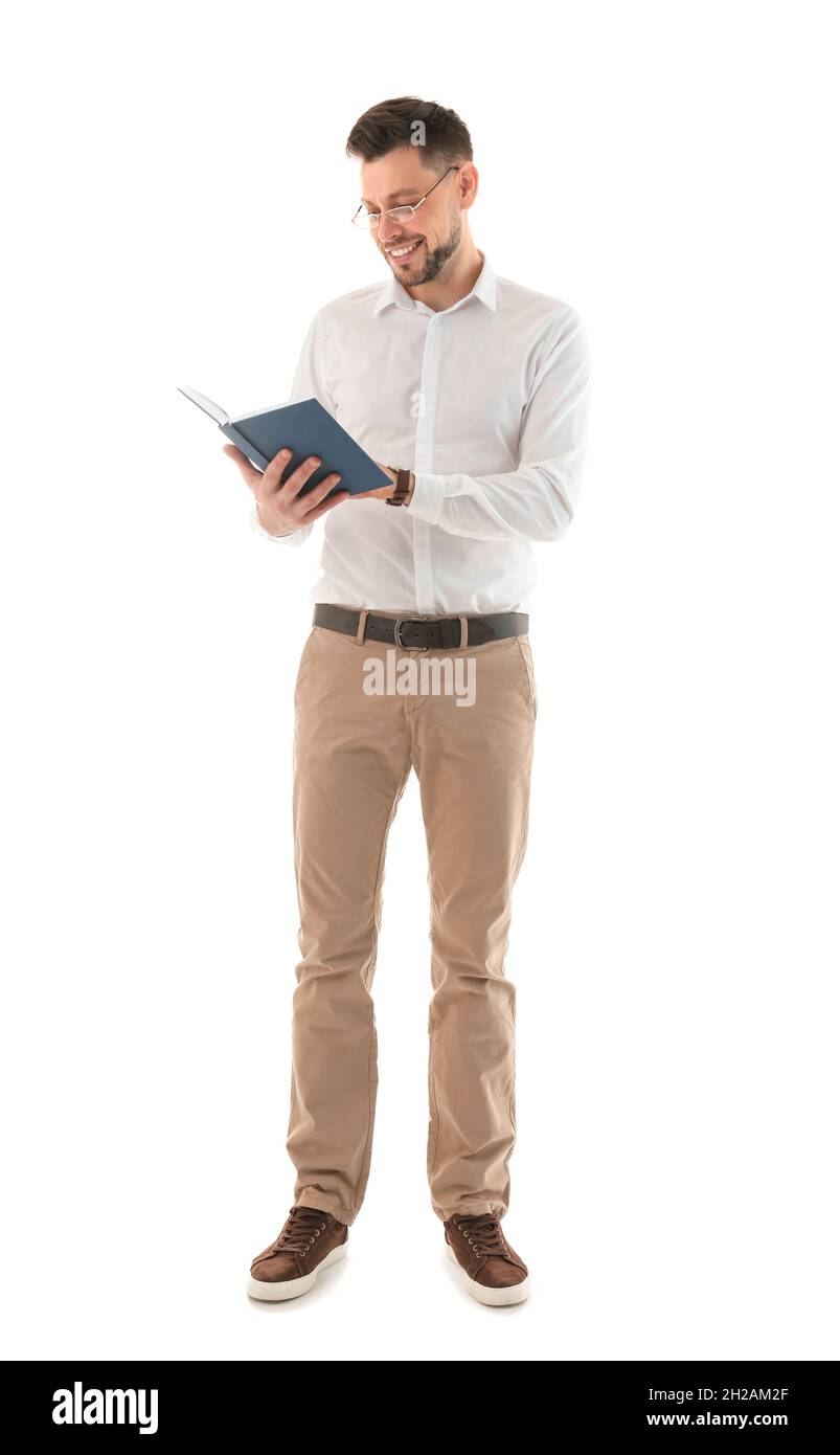 Male teacher with book on white background Stock Photo - Alamy