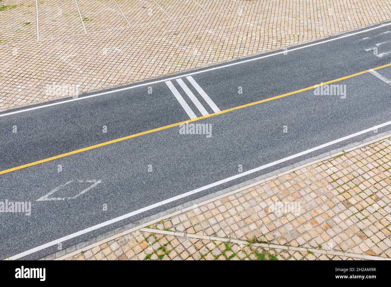 Asphalt road pavement scene.High angle view Stock Photo - Alamy