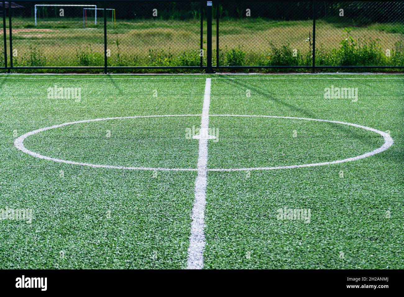 Artificial turf football field Stock Photo - Alamy