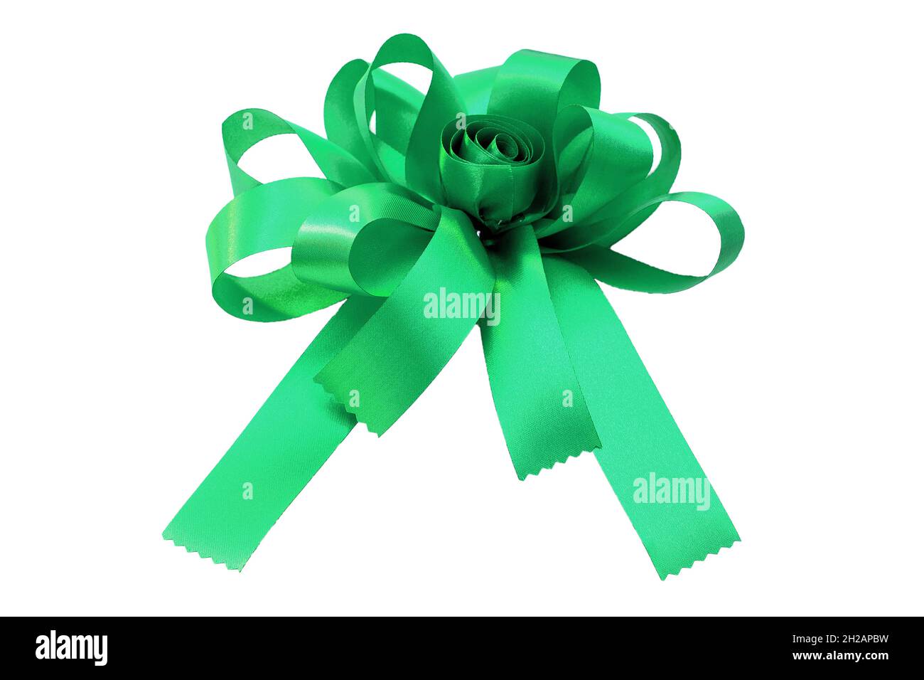 Green ribbon bow isolated on white background Stock Photo - Alamy