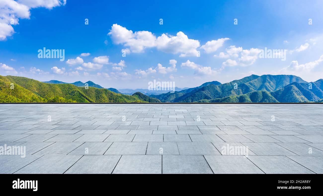 Square floor and green mountain natural scenery in summer Stock Photo ...