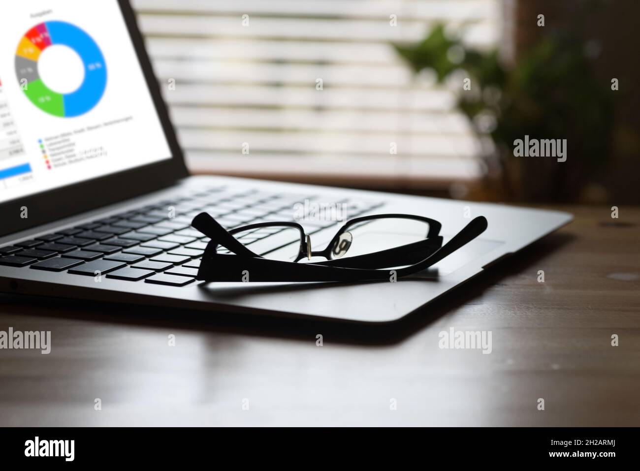 A computer in the office and the economy Stock Photo - Alamy