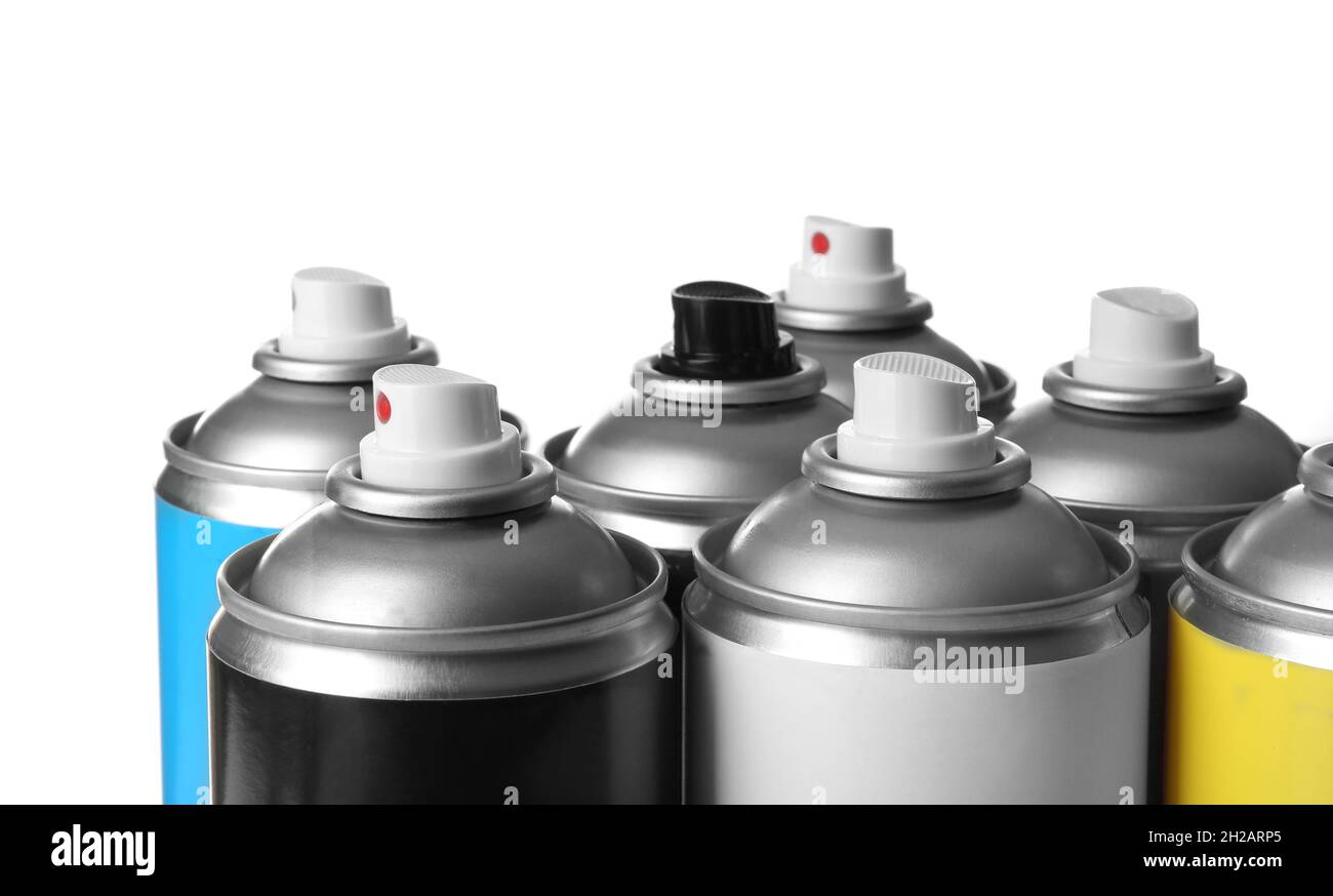 Cans of different spray paints on white background, closeup Stock Photo ...