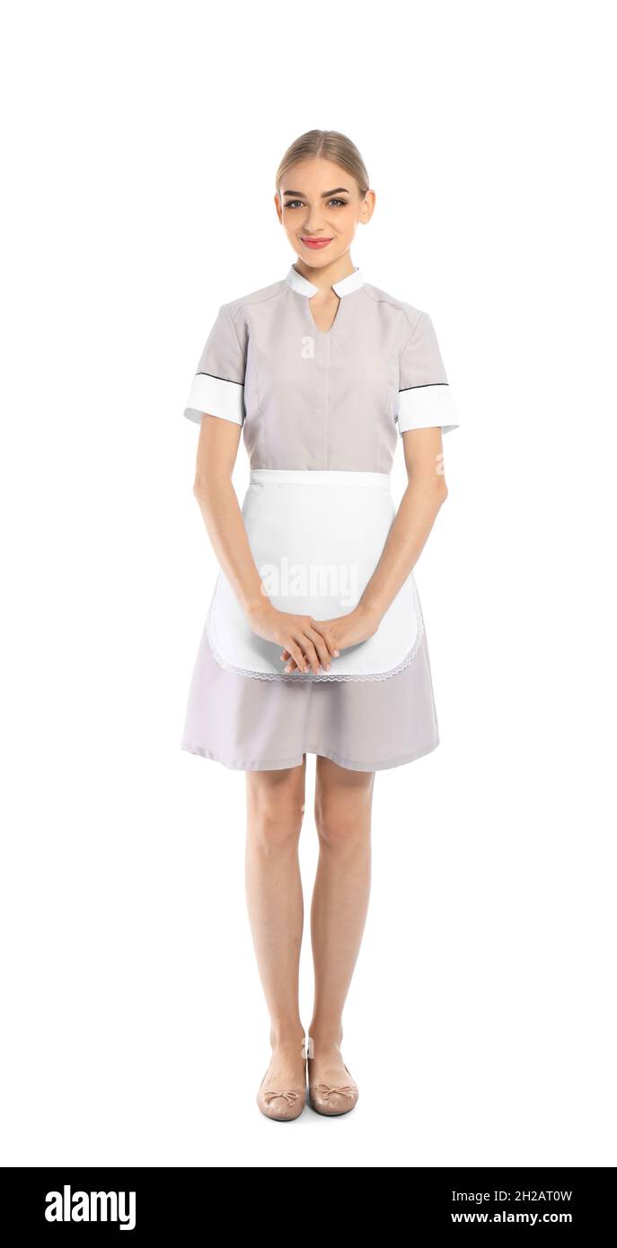 Full length portrait of young chambermaid in tidy uniform on white ...
