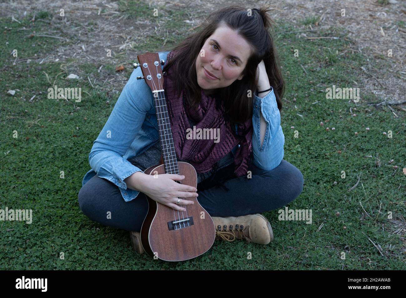 girl playing the ukulele Stock Photo - Alamy