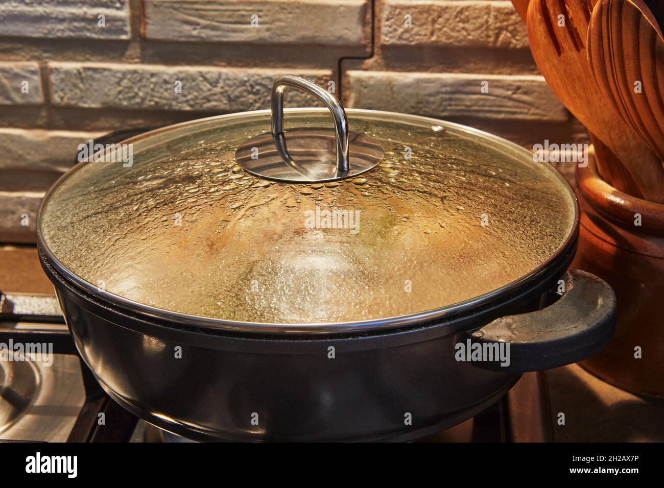 Cooking in metal pan according to recipe from the Internet Stock Photo ...