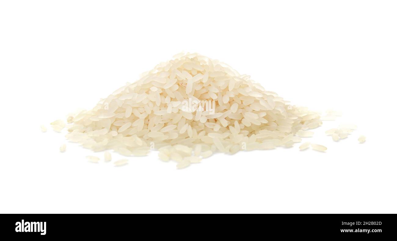 Pile of uncooked rice on white background Stock Photo - Alamy