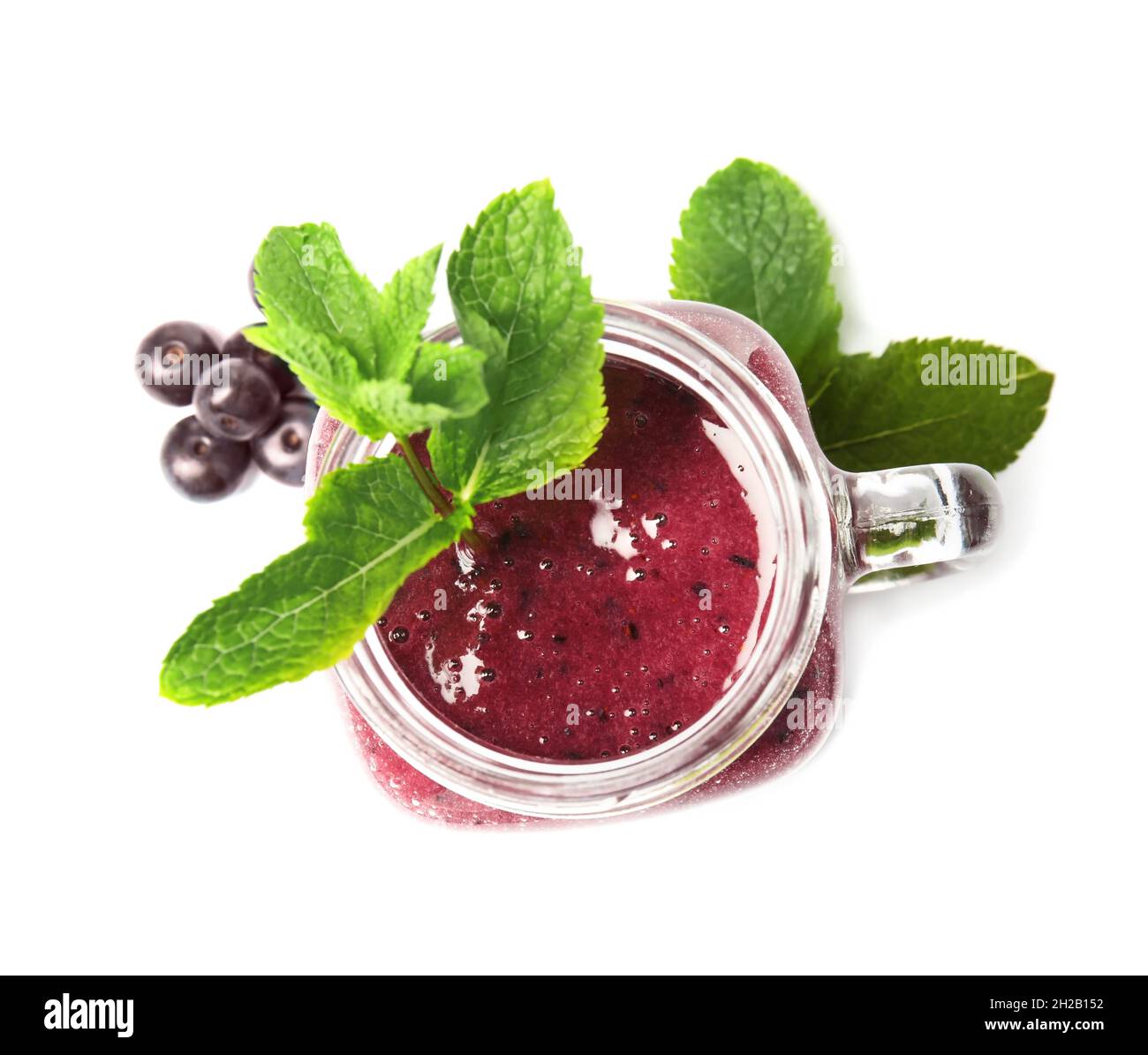 Mason jar with delicious acai smoothie on white background Stock Photo ...