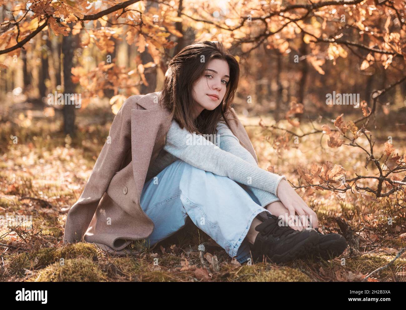 Portrait of a thoughtful and sad girl. Autumn colors . Lifestyle ...