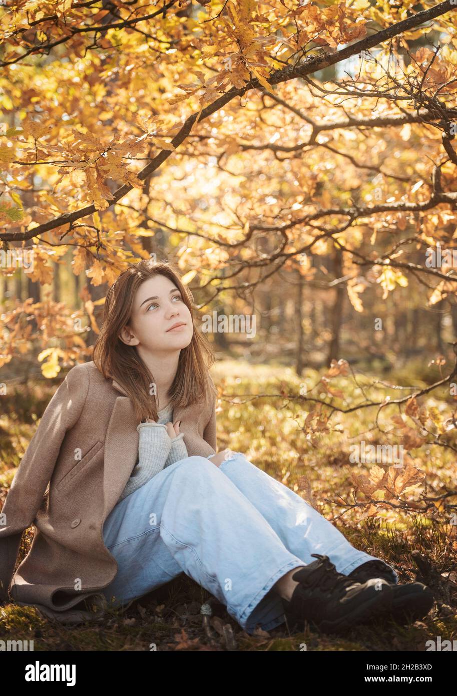 Young teenager girl in the autumn forest. Autumn colors . Lifestyle ...